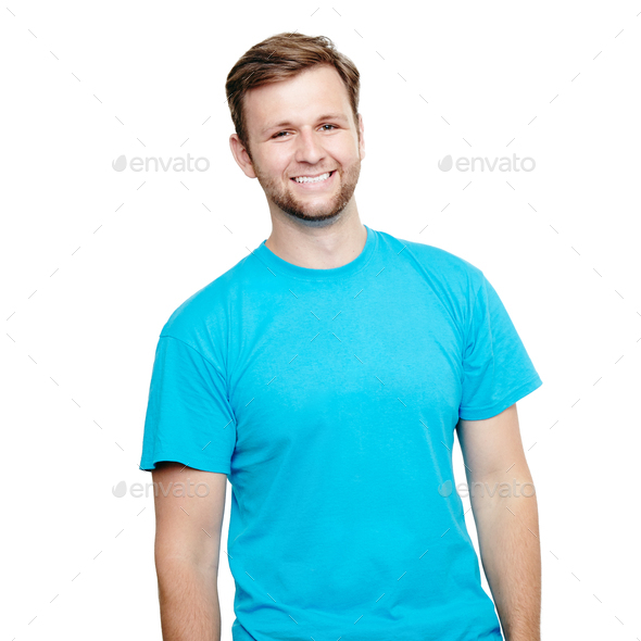 Smiling young man standing. Blue t-shirt design concept Stock Photo by ...