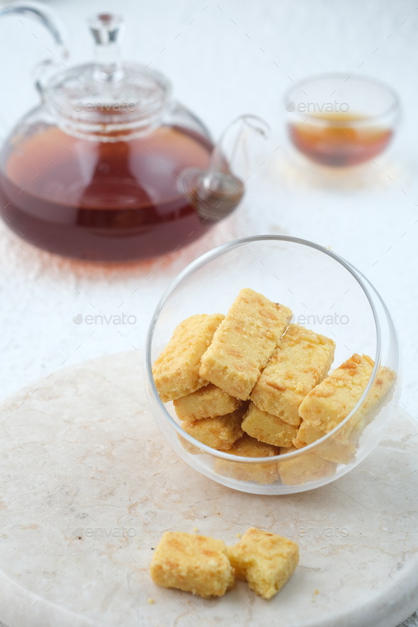 Cheese snack sticks or Kaasstengels, Kastengel or kue keju with tea and ...