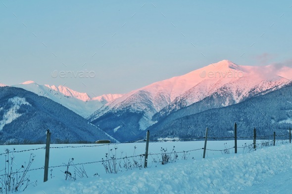 Snowy mountains, sunset, blue sky, blue background, beautiful ...