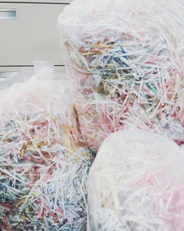Shredded paper!! Time to clean out your files Stock Photo by rubypeanut