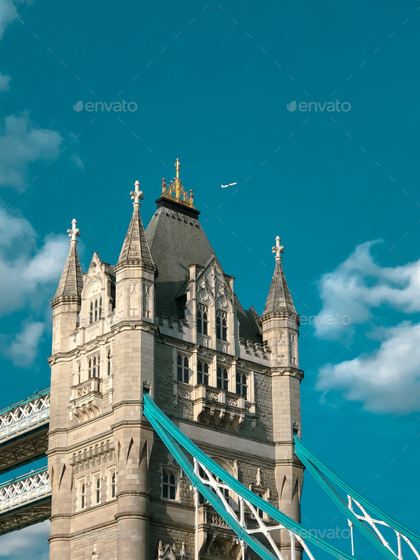 Tower bridge and a plane Stock Photo by baranastasia | PhotoDune