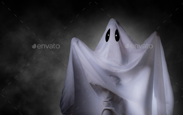 Scary white ghost at big eye for Halloween concept with clipping path ...
