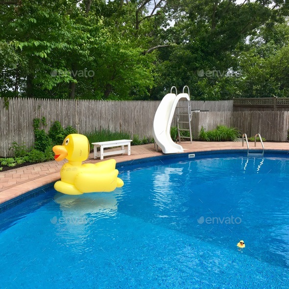 Ducky pool float Stock Photo by laurent106 | PhotoDune