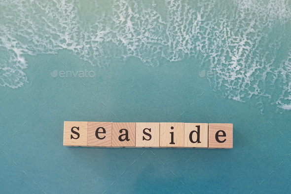 Wooden block word “seaside” over the ocean Stock Photo by areec1 ...