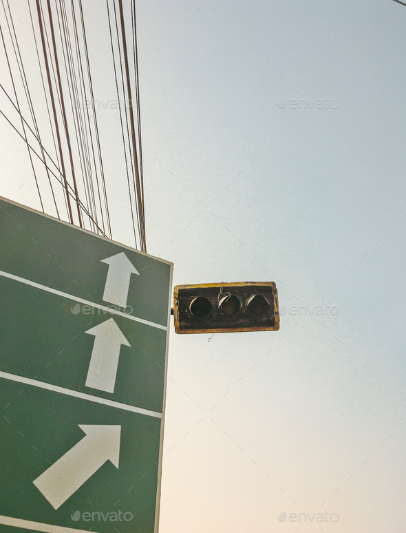 Rusty old traffic lights that doesn’t work anymore Stock Photo by Talha988