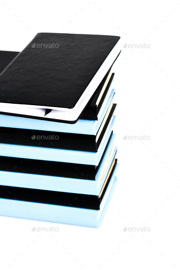 Stack of black and blue books isolated on white Stock Photo by ...