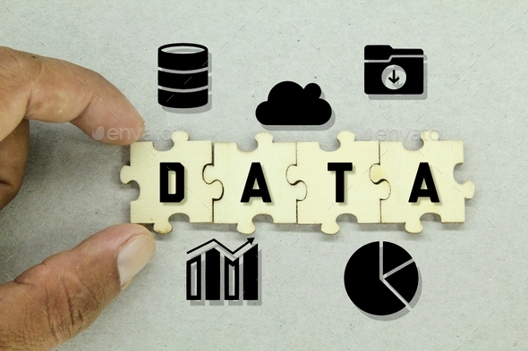Wooden puzzles with data icons and data words. data concept Stock Photo ...