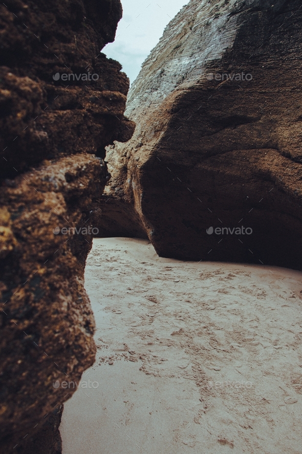 Depth of field in the beach. Sand. Cliff. Walking path. Summer vibe ...