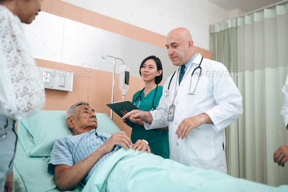 professional doctor standing by explain the treatment information via ...