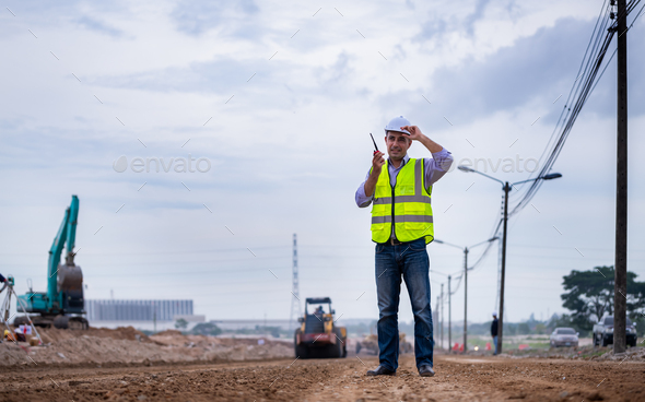 Construction engineer wear safety uniform under inspection and survey ...