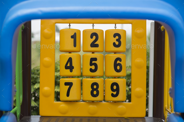 Cubes with numbers are on playground. Stock Photo by FamilyStock ...