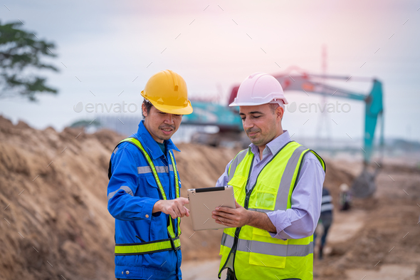 Construction engineer wear safety uniform under inspection and survey ...