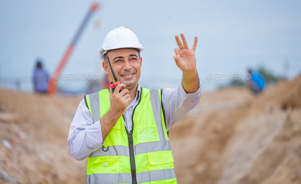 Construction engineer wear safety uniform under inspection and survey ...