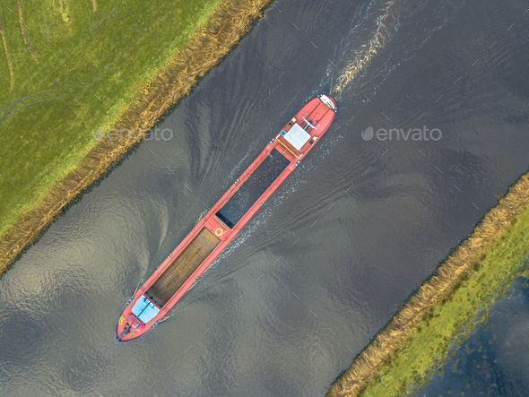 Moving Inland freight ship Aerial view Stock Photo by CreativeNature_nl