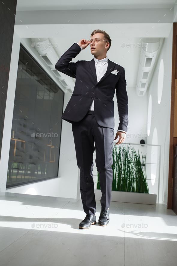 Stylish man in suit posing Stock Photo by kegfire | PhotoDune