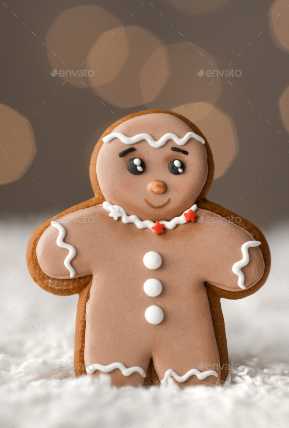 Vertical photo of sweet present gingerbread man cookie. Ginger bread ...