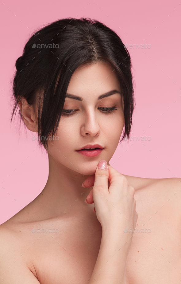 Beautiful female looking down in studio Stock Photo by kegfire | PhotoDune