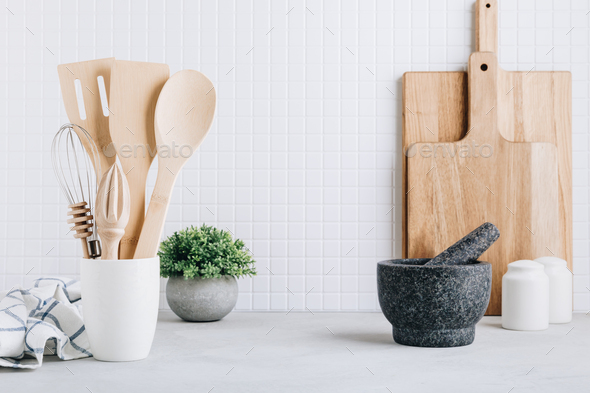 Kitchen utensils. Kitchen wooden tools and kitchenware. White modern ...