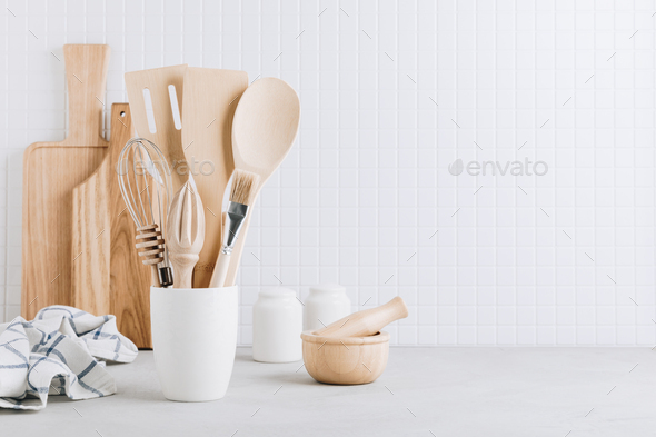 Kitchen utensils. Kitchen wooden tools and kitchenware. White modern ...