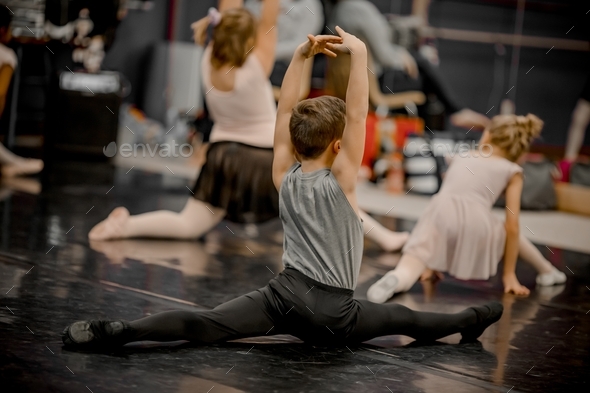 Boy in ballet class doing the splits Stock Photo by hwilson8 | PhotoDune