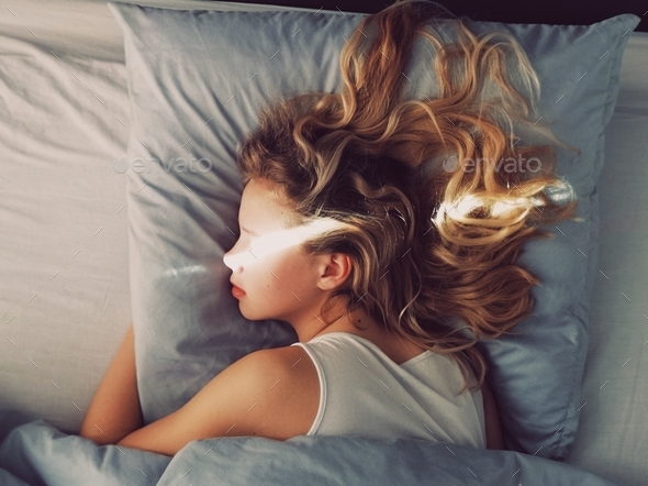 First morning sun on her face Stock Photo by wikaatje | PhotoDune
