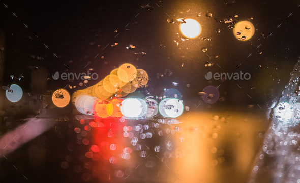 Colorful street light on the rainy night Stock Photo by Studio_OMG