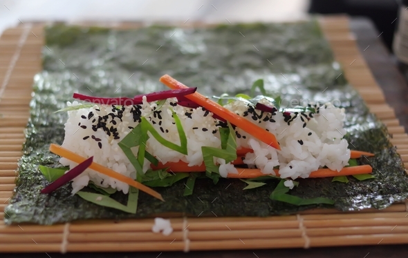 The ingredients of maki sushi roll on the bamboo rolling mat Stock ...