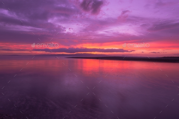Purple colorful sunset sky reflection over water lake background nature ...