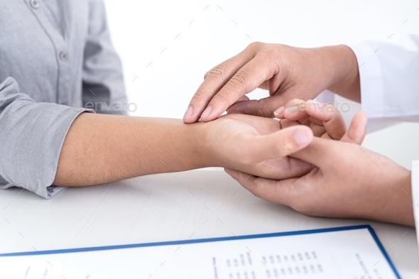 Doctor pulse measurement checking patient with examining, presenting ...