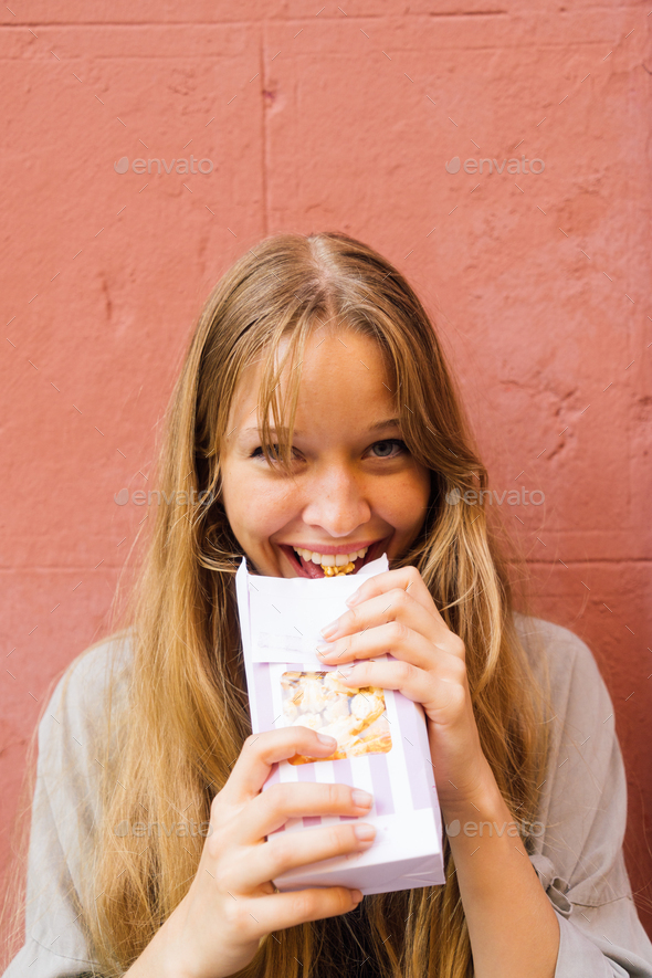 Closeup on blonde girl eating pop corns Stock Photo by kikea3 | PhotoDune