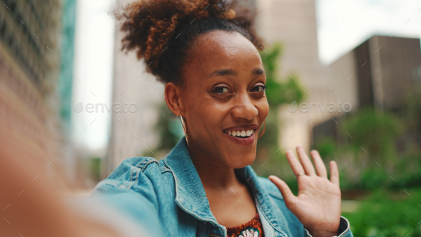 Closeup portret cute African girl makes stream, video call on ...