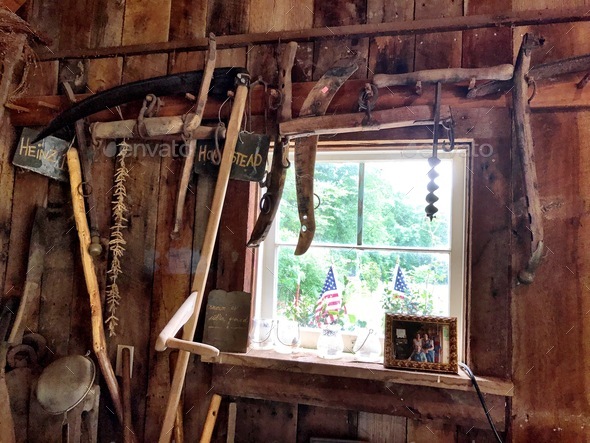 Farming tool hanging on the barn wall Stock Photo by bethanyellis28