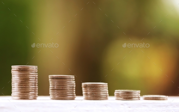 Stack of money coins blur background Stock Photo by wandeaw | PhotoDune