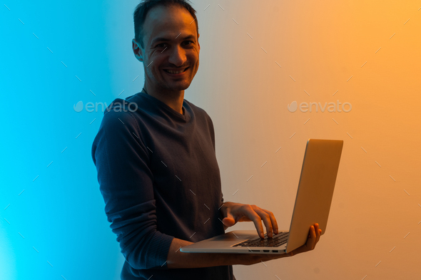 man with laptop color background Stock Photo by Angelov1 | PhotoDune