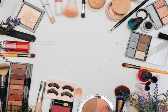 Different types of cosmetics flat lay on white background with copy ...