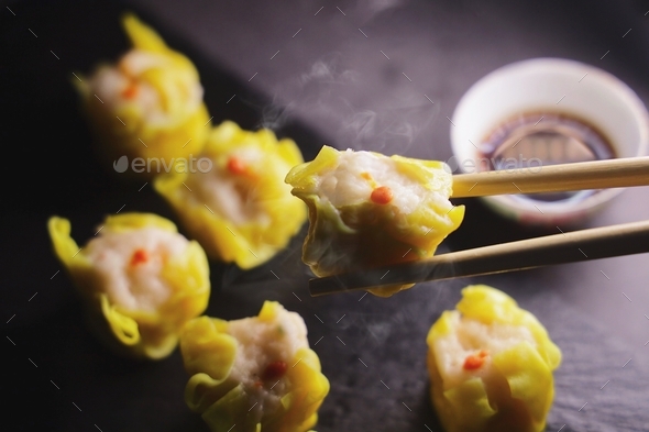 Chinese dim sum on black tray Stock Photo by wiriyathitiporn | PhotoDune