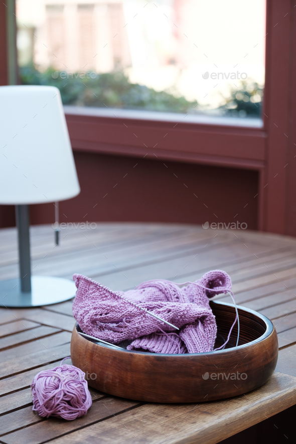 Knitting project of knitting women's pink sweater in progress. Stock ...