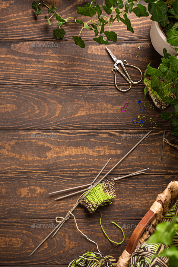 Female hobby knitting. Knitting project in progress Stock Photo by Merinka