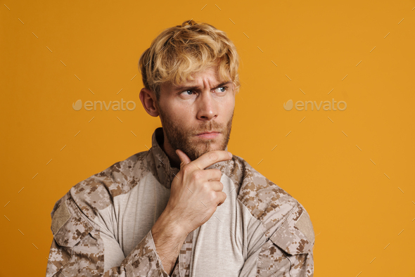 European military man wearing uniform frowning and looking aside Stock ...