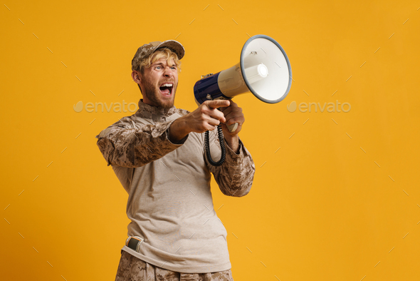 European military man wearing uniform shouting in megaphone Stock Photo ...