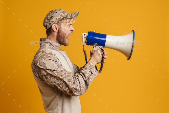 European military man wearing uniform shouting in megaphone Stock Photo ...