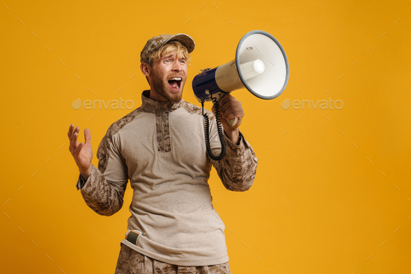 European military man wearing uniform shouting in megaphone Stock Photo ...