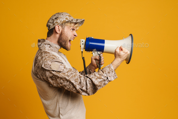 European military man wearing uniform shouting in megaphone Stock Photo ...
