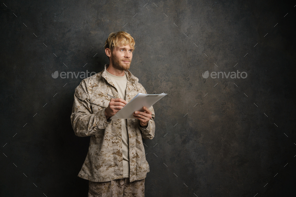 White military man wearing uniform posing with clipboard Stock Photo by ...