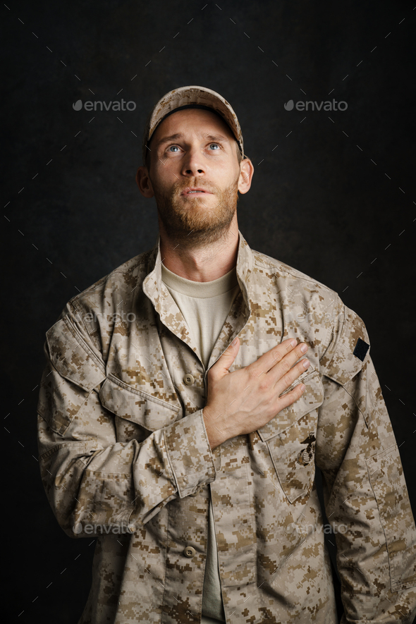 White military man wearing uniform holding hand on his chest Stock ...