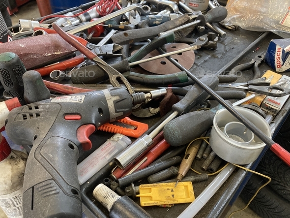 Tools in a car garage Stock Photo by fredlackner | PhotoDune