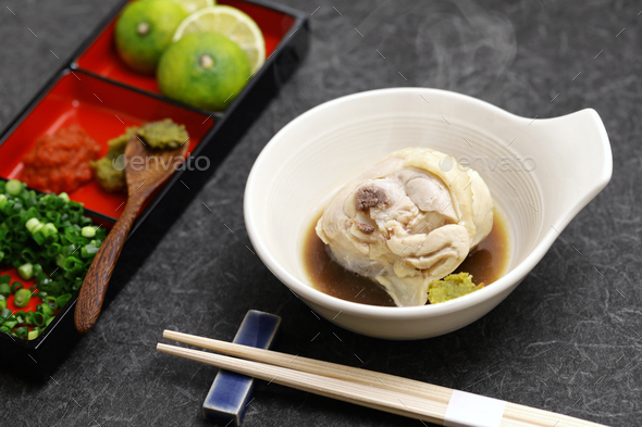 Mizutaki, Japanese chicken hot pot; served the hot pot dish into a bowl ...