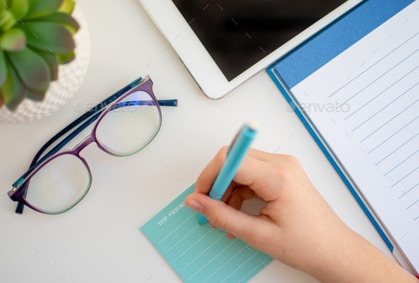 Writing on a sticky note Stock Photo by mary_8405 | PhotoDune