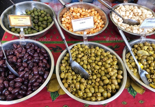 Olives for sale on a stall at a street market Stock Photo by JosieElias
