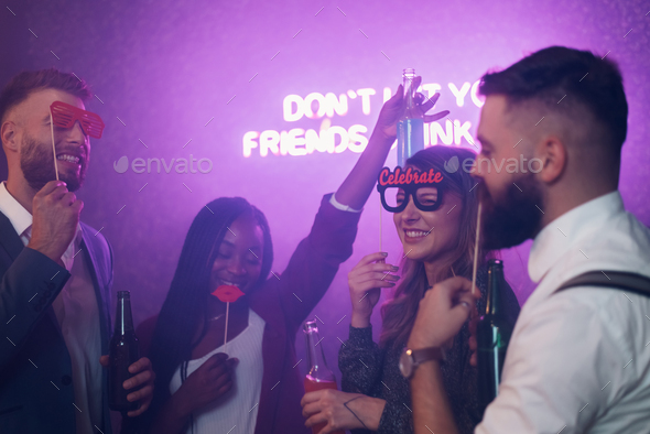 Happy group of friends dancing on a party in a club Stock Photo by ...